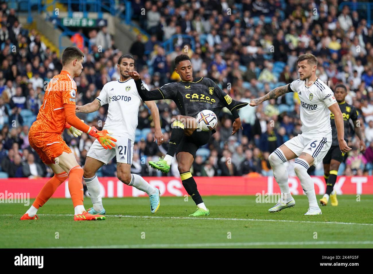 Leeds United's Liam Cooper (right) pulls back on Aston Villa's Jacob ...