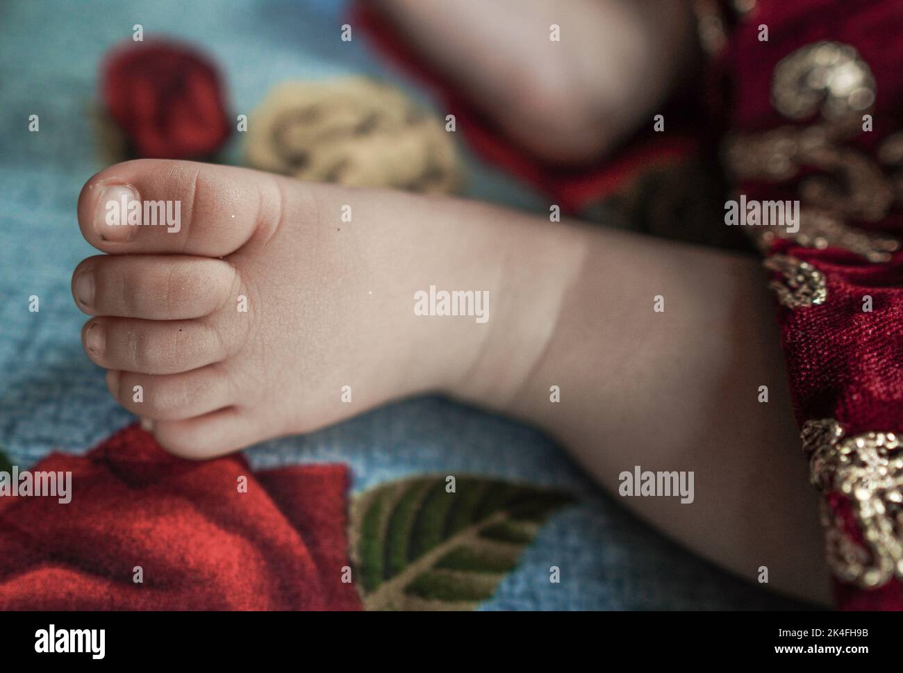 Small and cute feet of a baby Stock Photo - Alamy