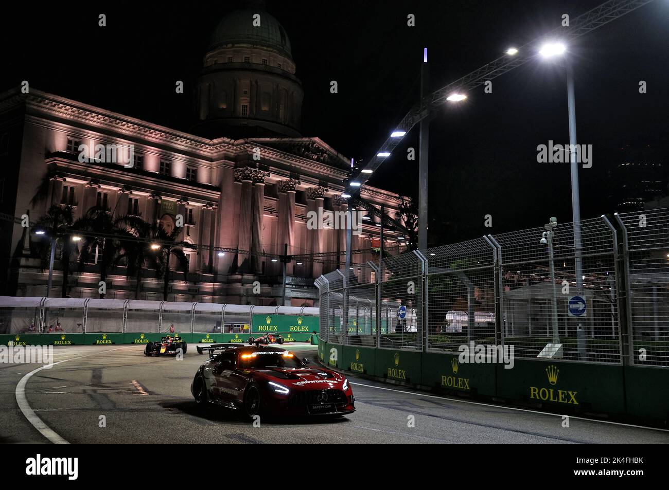 Sergio Perez (MEX) Red Bull Racing RB18 leads behind the Mercedes AMG ...