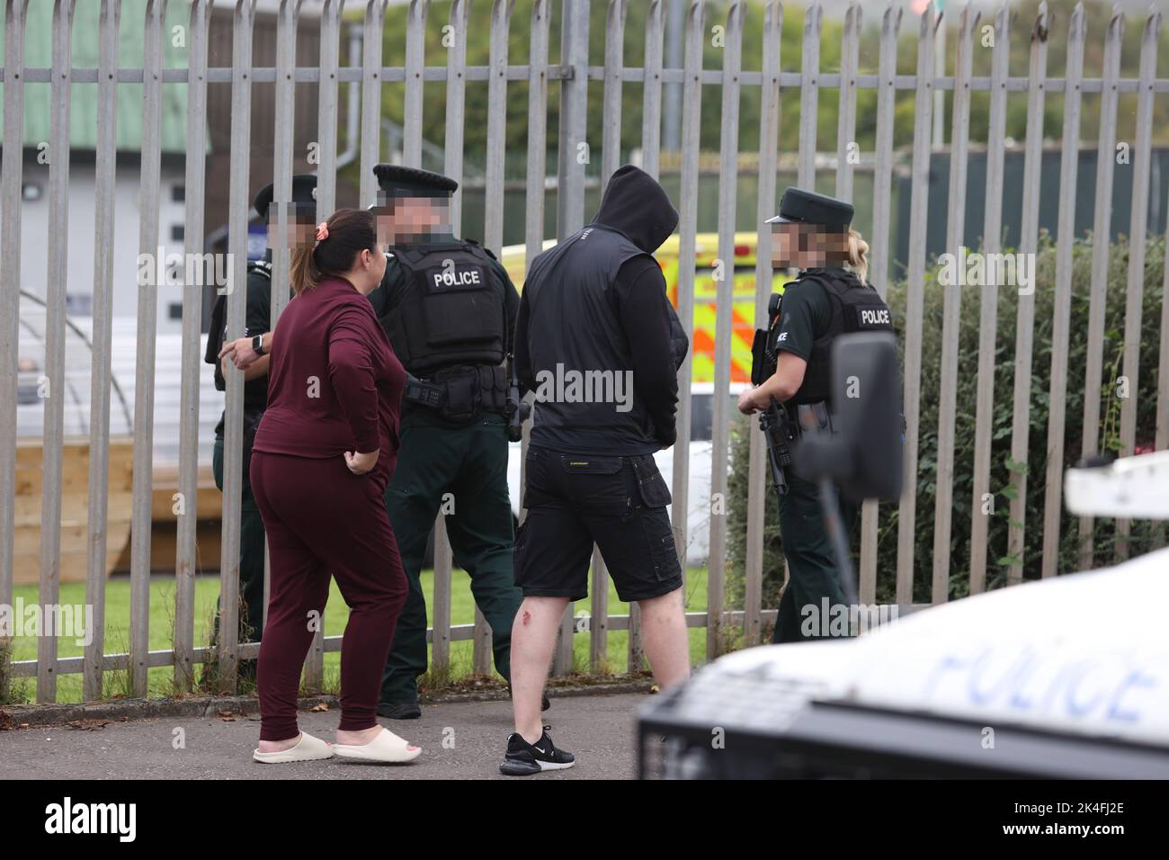 EDITORS NOTE IMAGE PIXELLATED BY THE PA PICTURE DESK PSNI officers at ...
