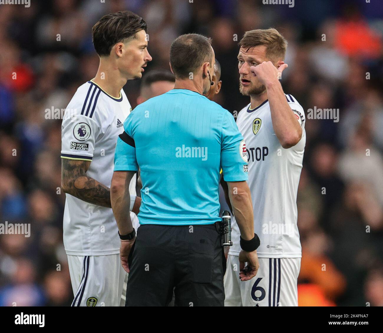 Liam Cooper #6 of Leeds United has words with referee Stuart Attwell ...