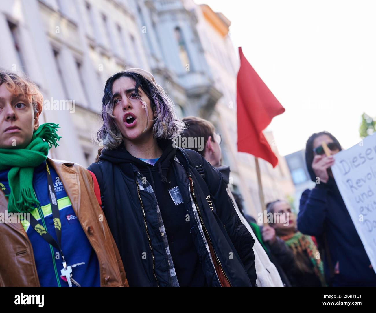 Berlin, Germany. 02nd Oct, 2022. Demonstrators hold hands and shout ...