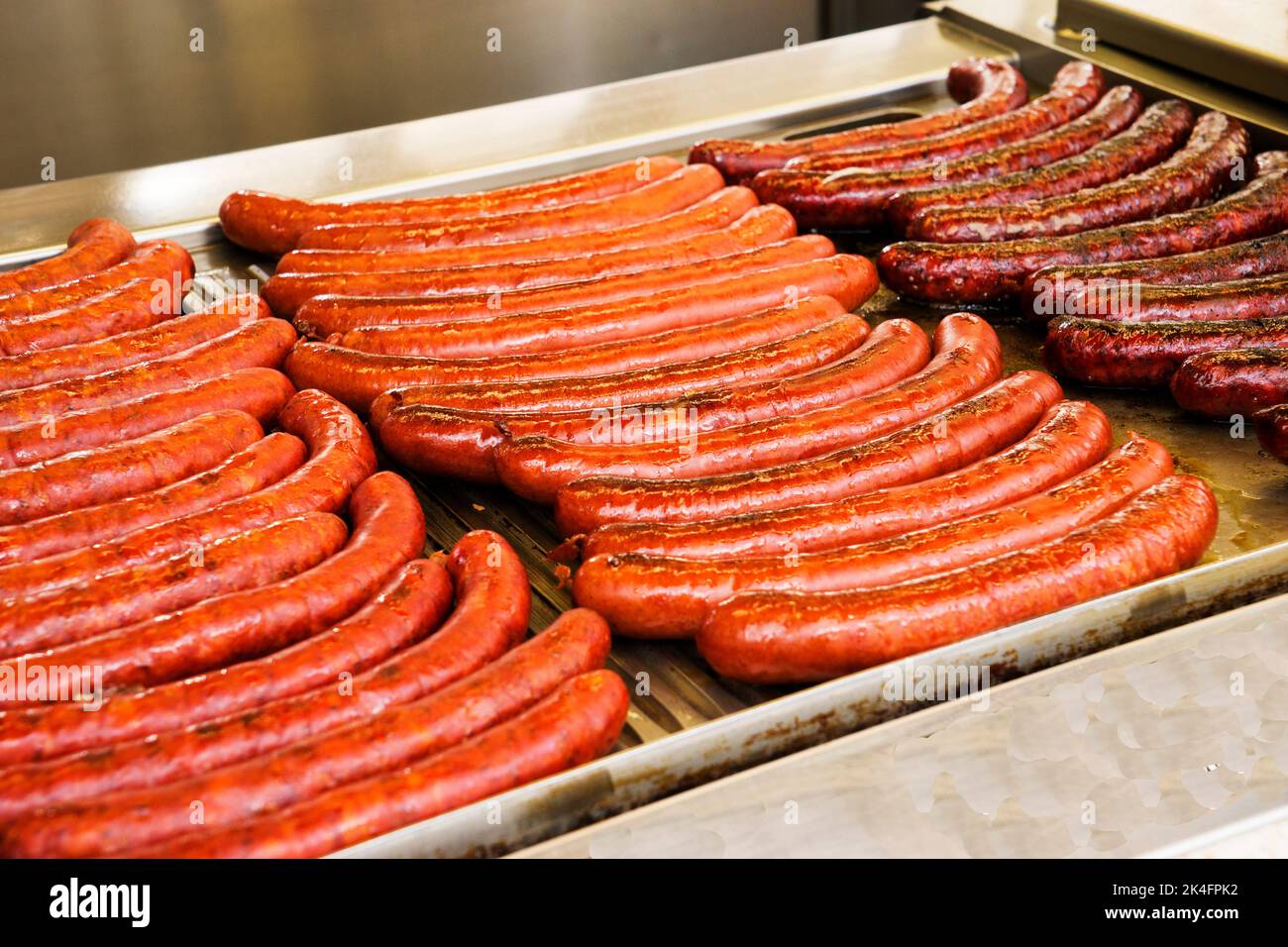 Grill czech sausages on on street food outdoor market. Fried baked ...
