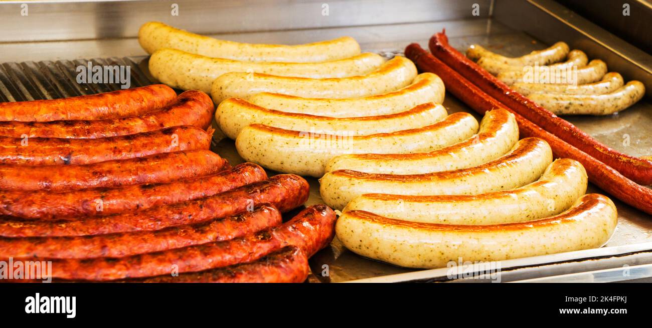 Grill czech sausages on on street food outdoor market. Fried baked ...