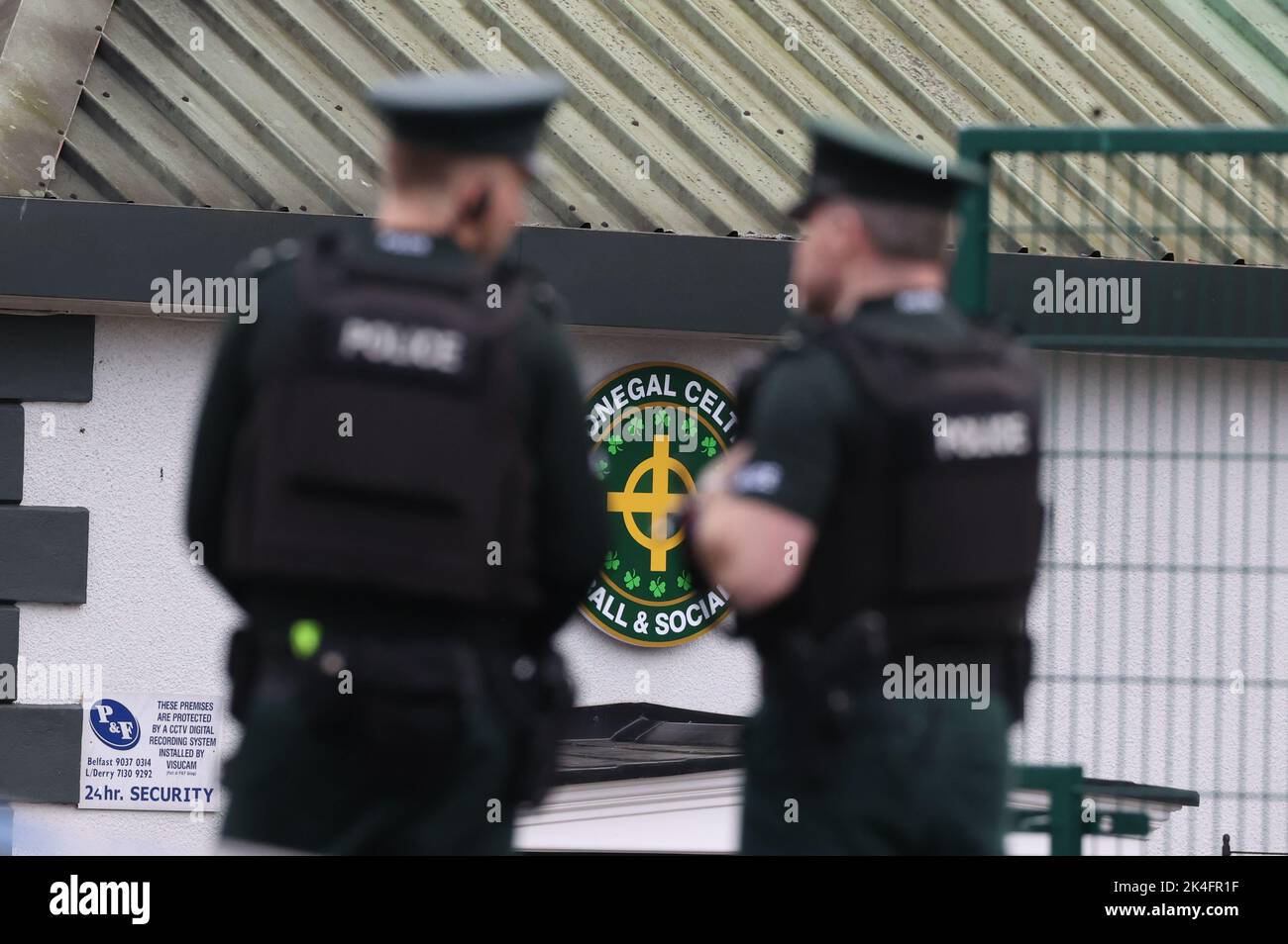 Officers from the PSNI at the scene following a shooting at the ...