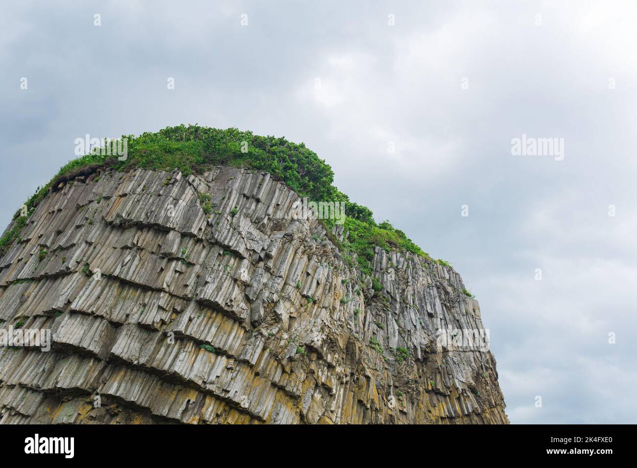 top of columnar volcanic basalt rocks on the island of Kunashir Stock ...