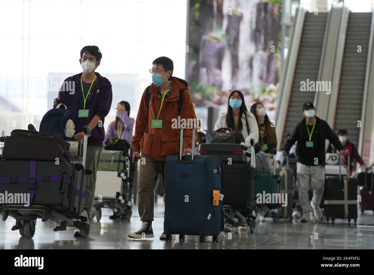 Inbound travellers arrive at the Hong Kong International Airport after ...