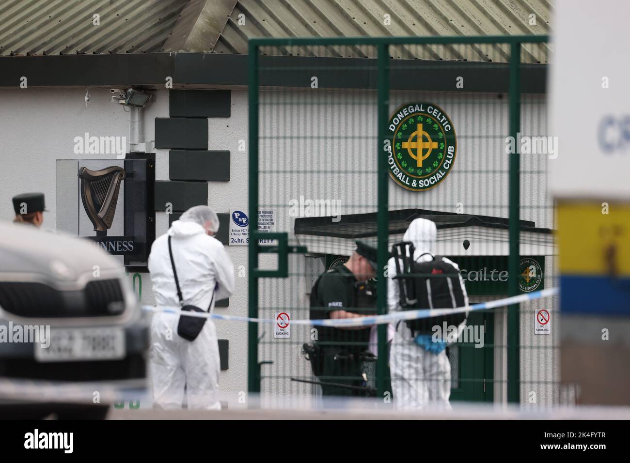 Scenes of crime officers from the PSNI at the scene following a ...