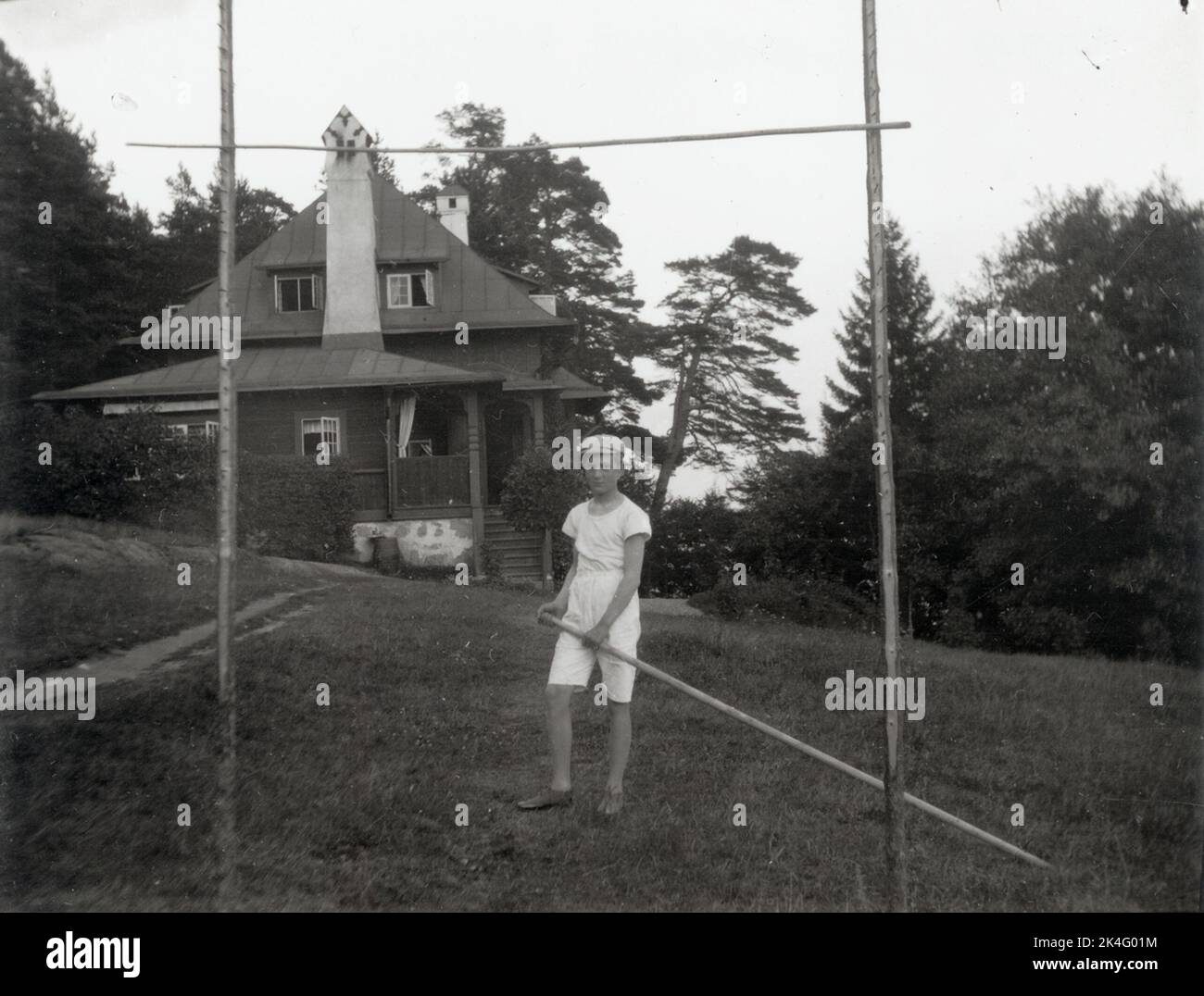 Boy was holding a high jump rod, posts and ribs next to it. Villa in ...