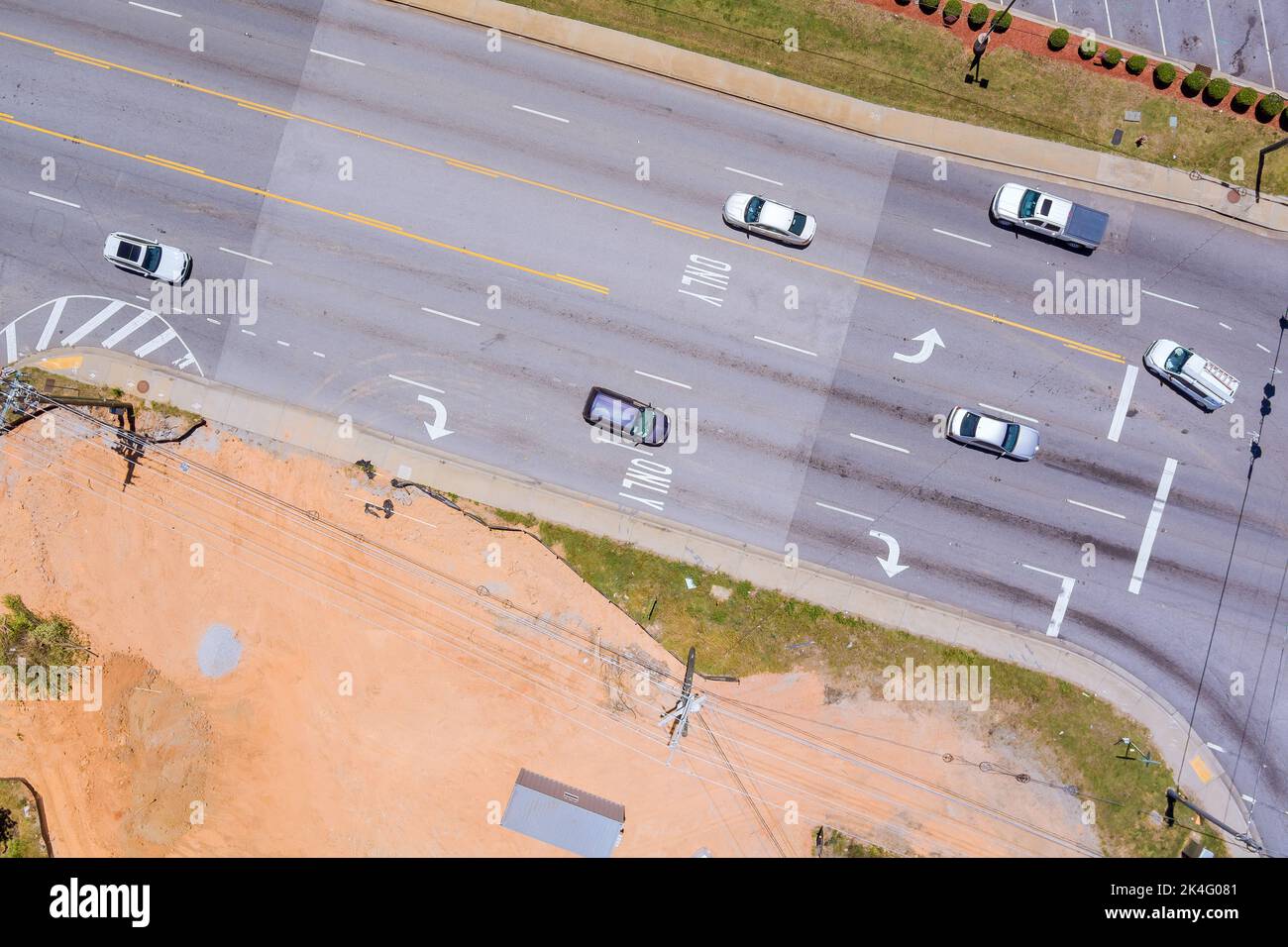 A traffic intersection where cars travel Stock Photo - Alamy