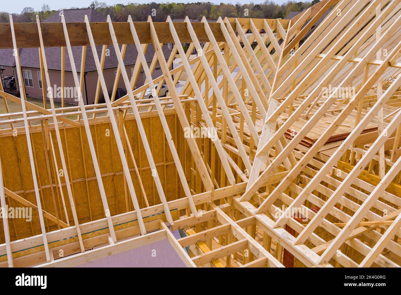 I am currently constructing a wooden truss roof beam for a new house ...