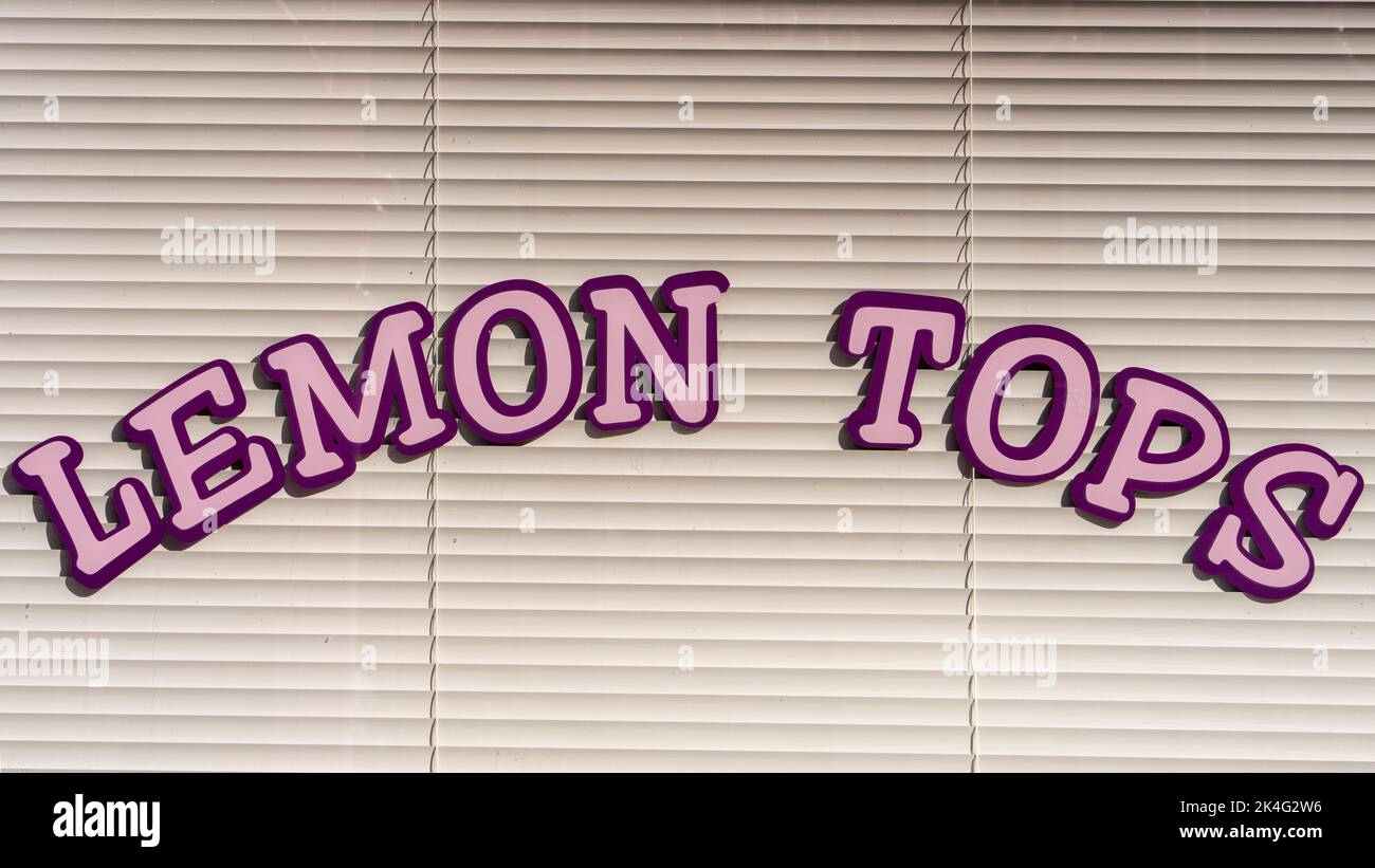 Wording in a shop window: ‘Lemon Tops’ - advertising the North ...