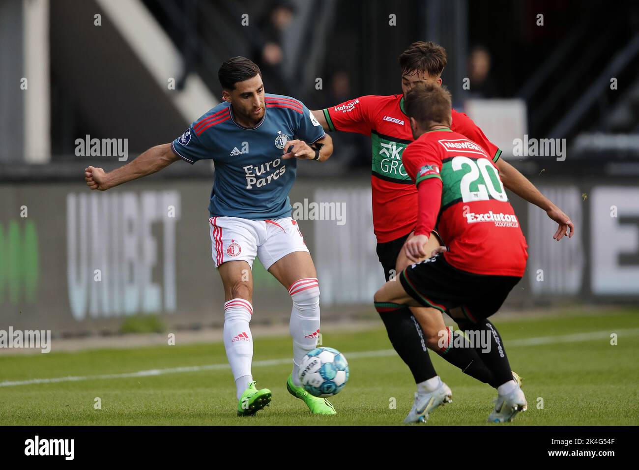 NIJMEGEN - (lr) Alireza Jahanbaksh of Feyenoord, Souffian El Karouani of NEC Nijmegen, Lasse ...