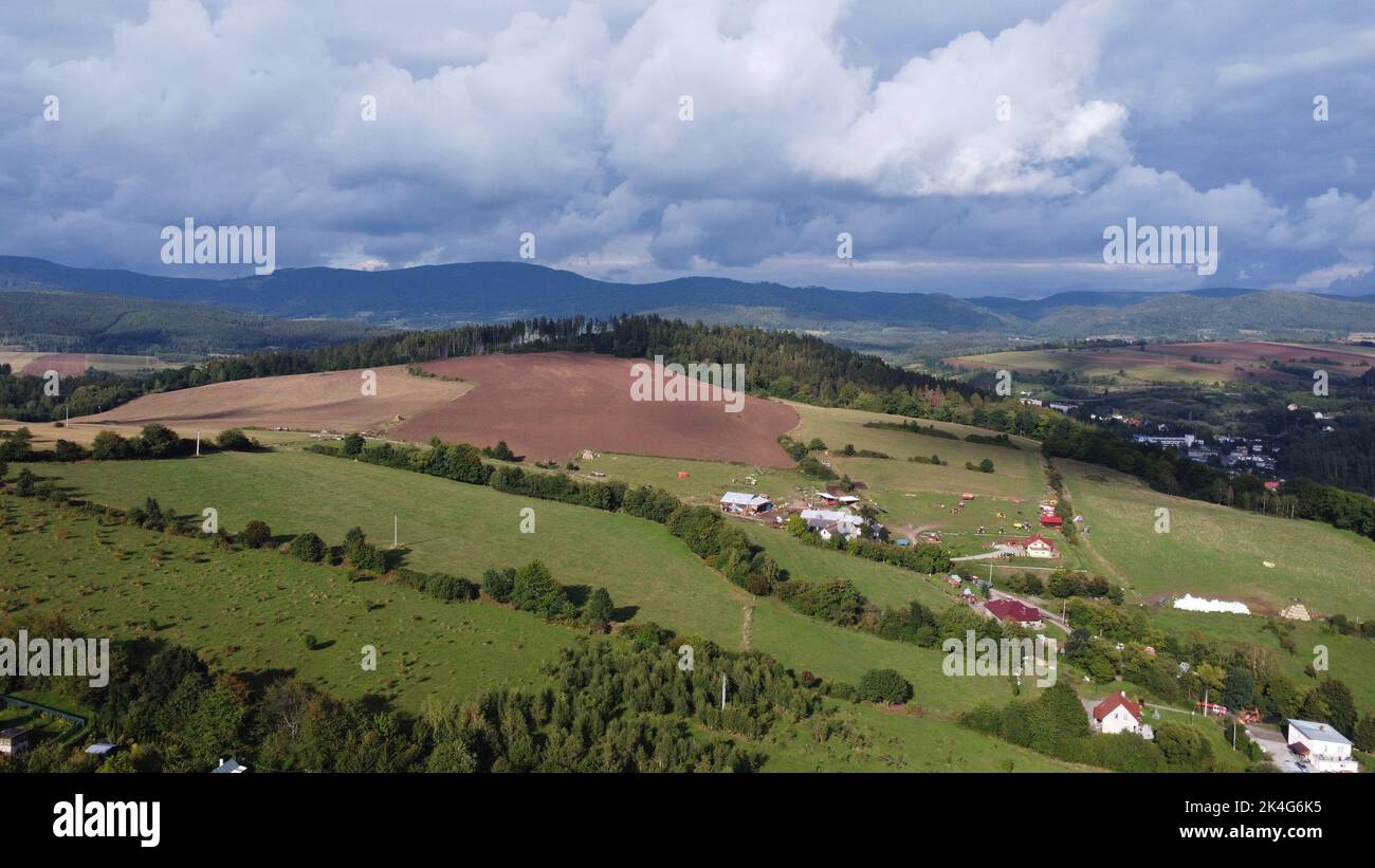 An aerial view of green land in the small Polish city of Nowa Ruda ...