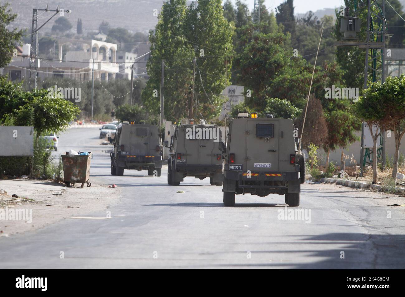 Israeli soldiers block the entrance to the village of Salem during a ...