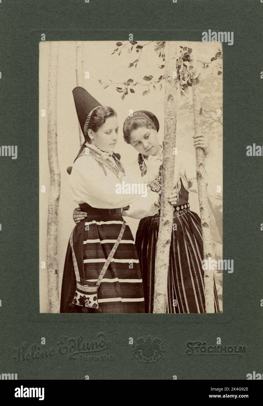 Two young women posing in different folk costumes Nordic Stock Photo ...