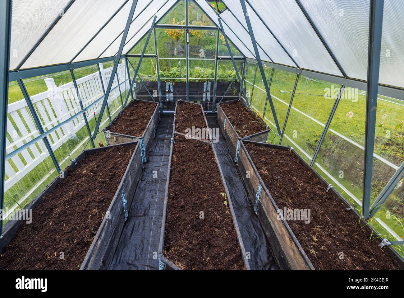 Close up view of autumn interior of greenhouse after harvest and ...