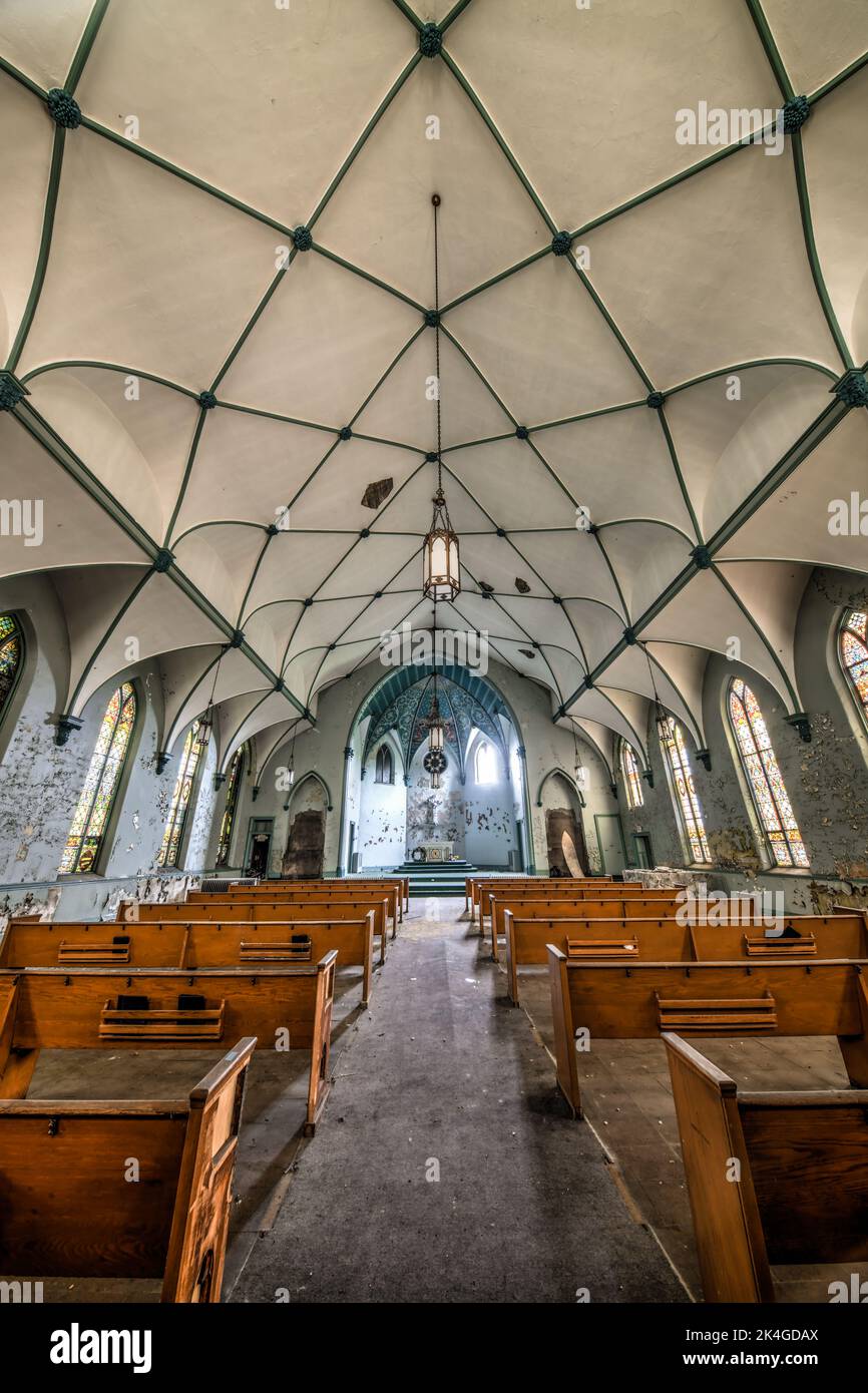 Abandoned church with spider ceiling Stock Photo - Alamy