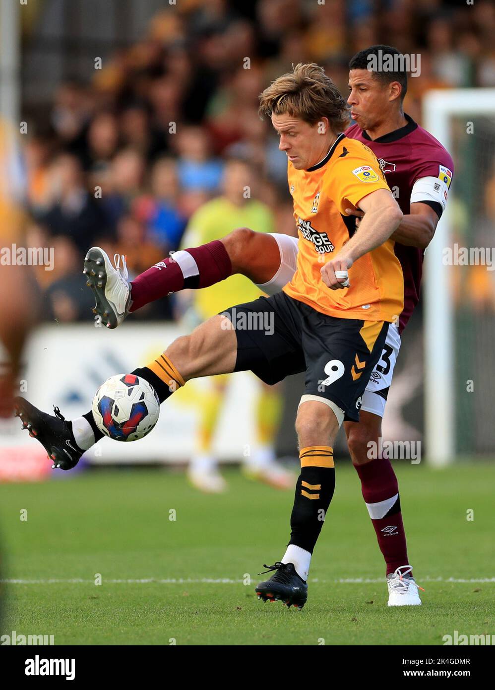 Derby County’s Curtis Davies battles with Cambridge’s Joe Ironside ...