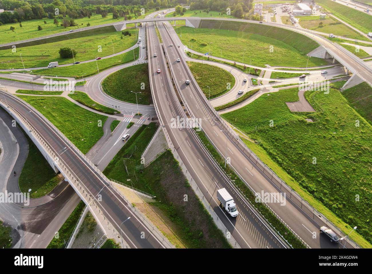 Car driving round roundabout hi-res stock photography and images - Alamy