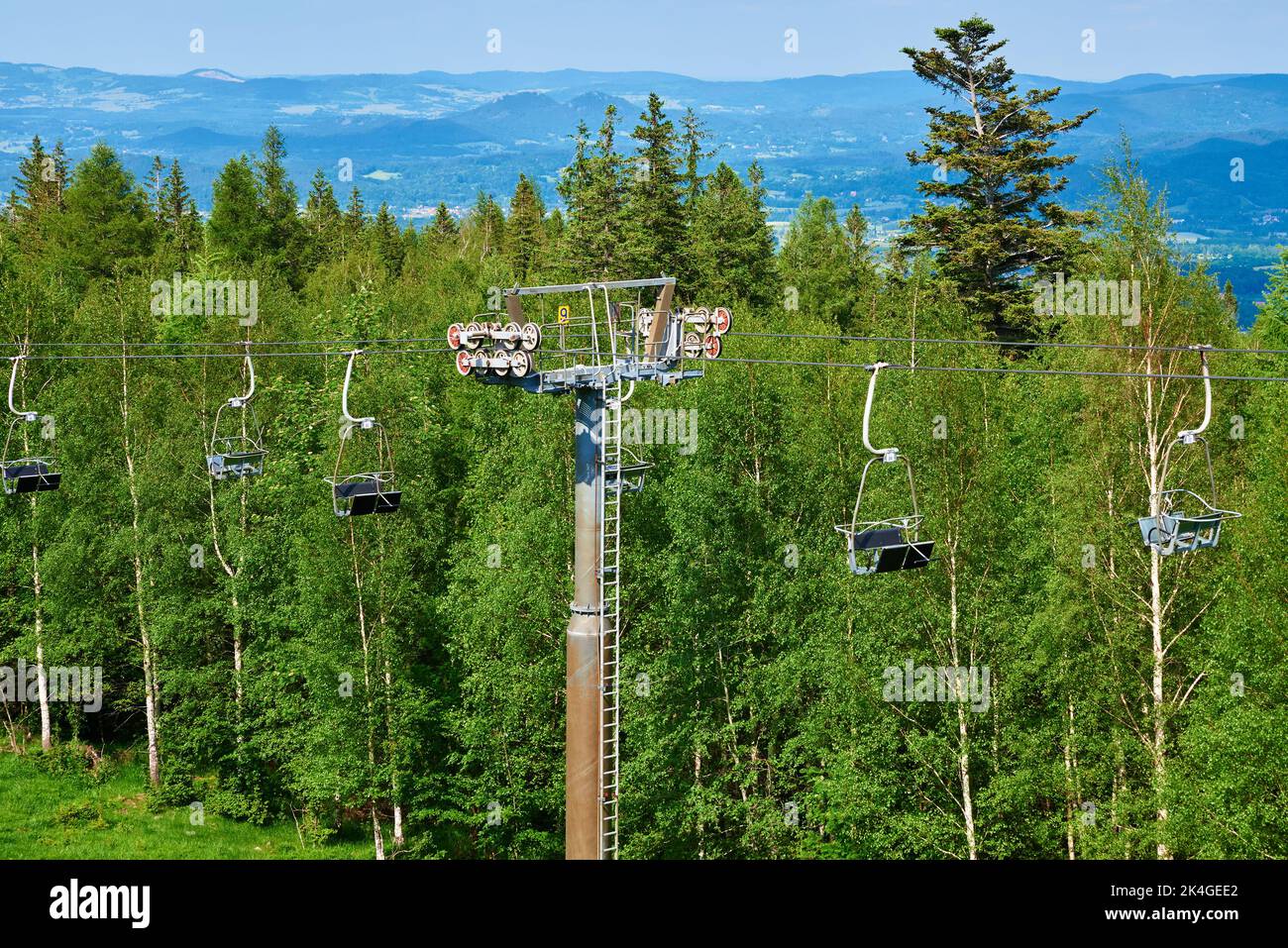 Open cable car line. Karpacz resort in Poland with lift road. Chairlift ...