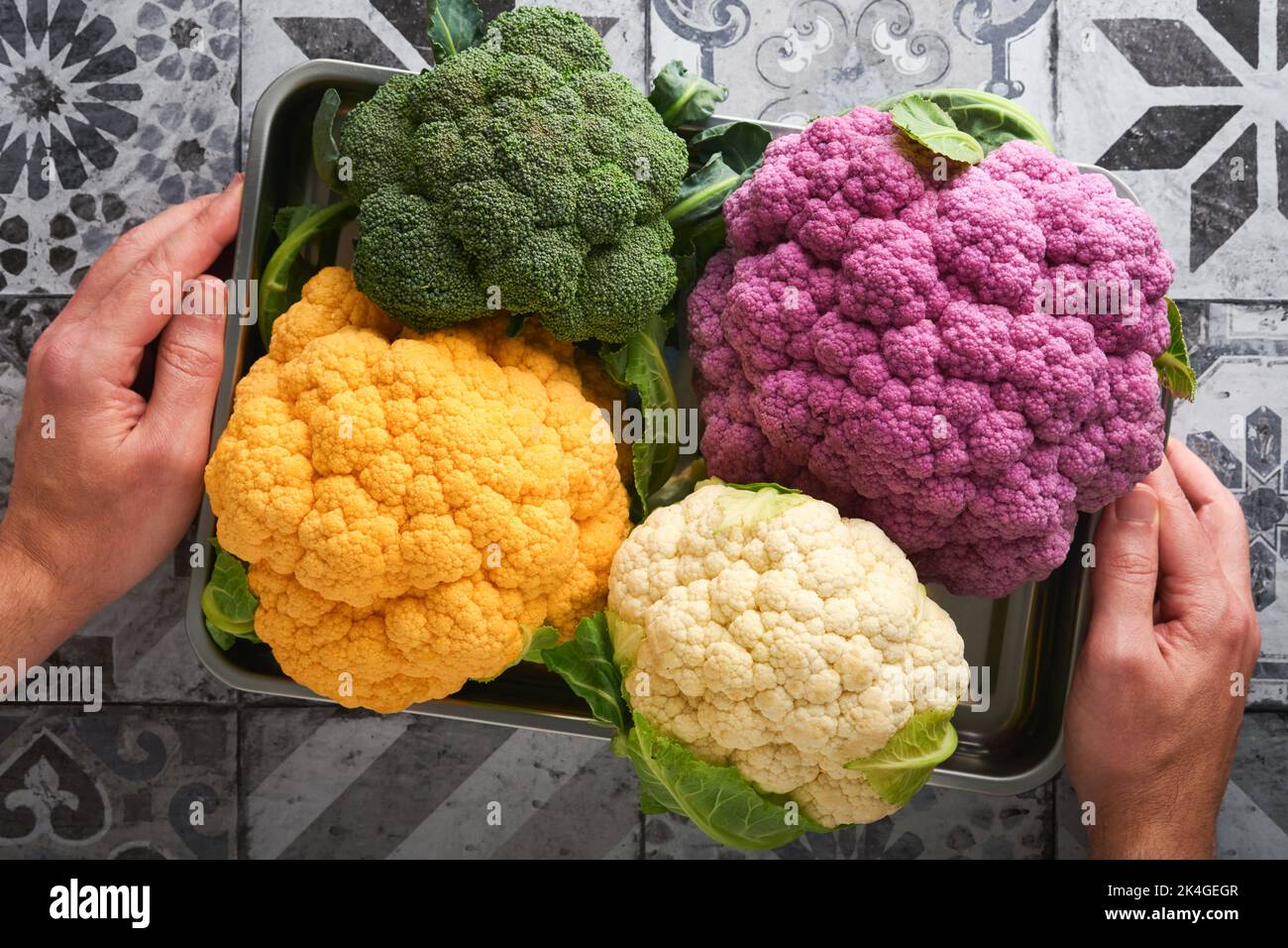 Colorfu cauliflower. Various sort of cauliflower in metal container ...