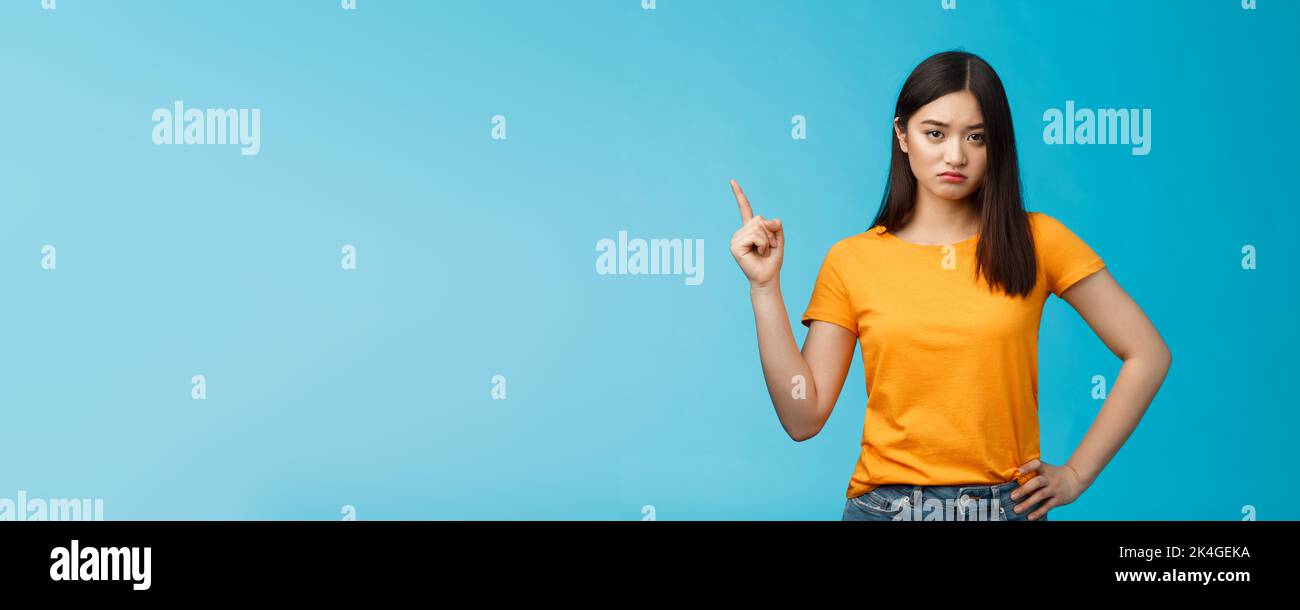 Moody upset asian girlfriend, sulking look offended and displeased ...