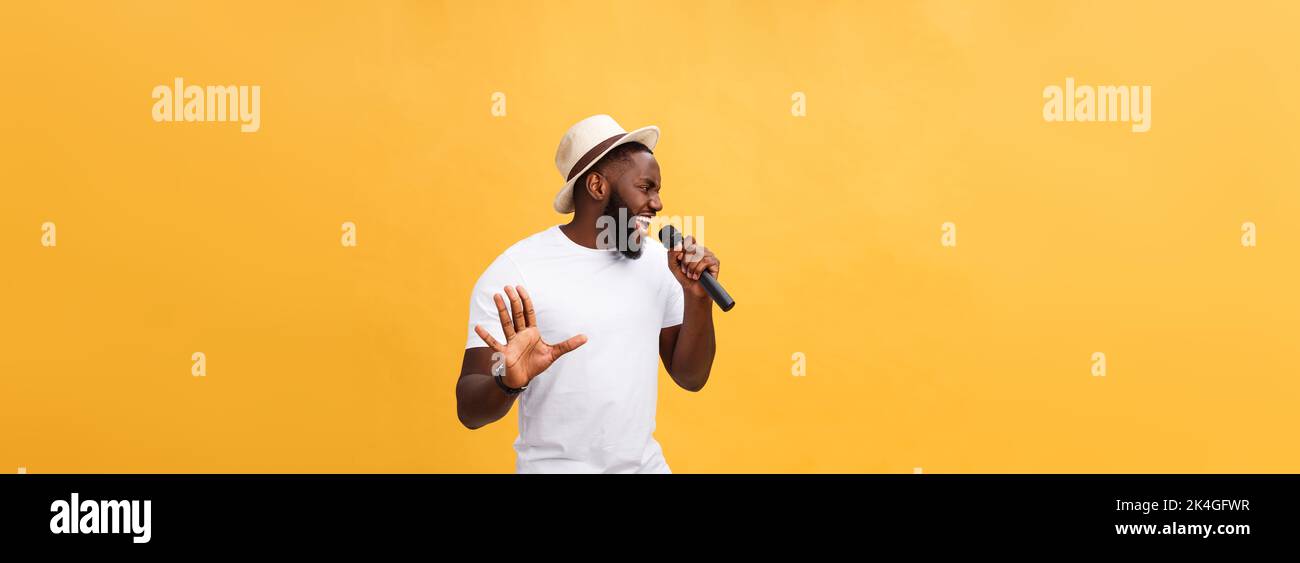 Young teenage black African American boy singer performing at a concert ...