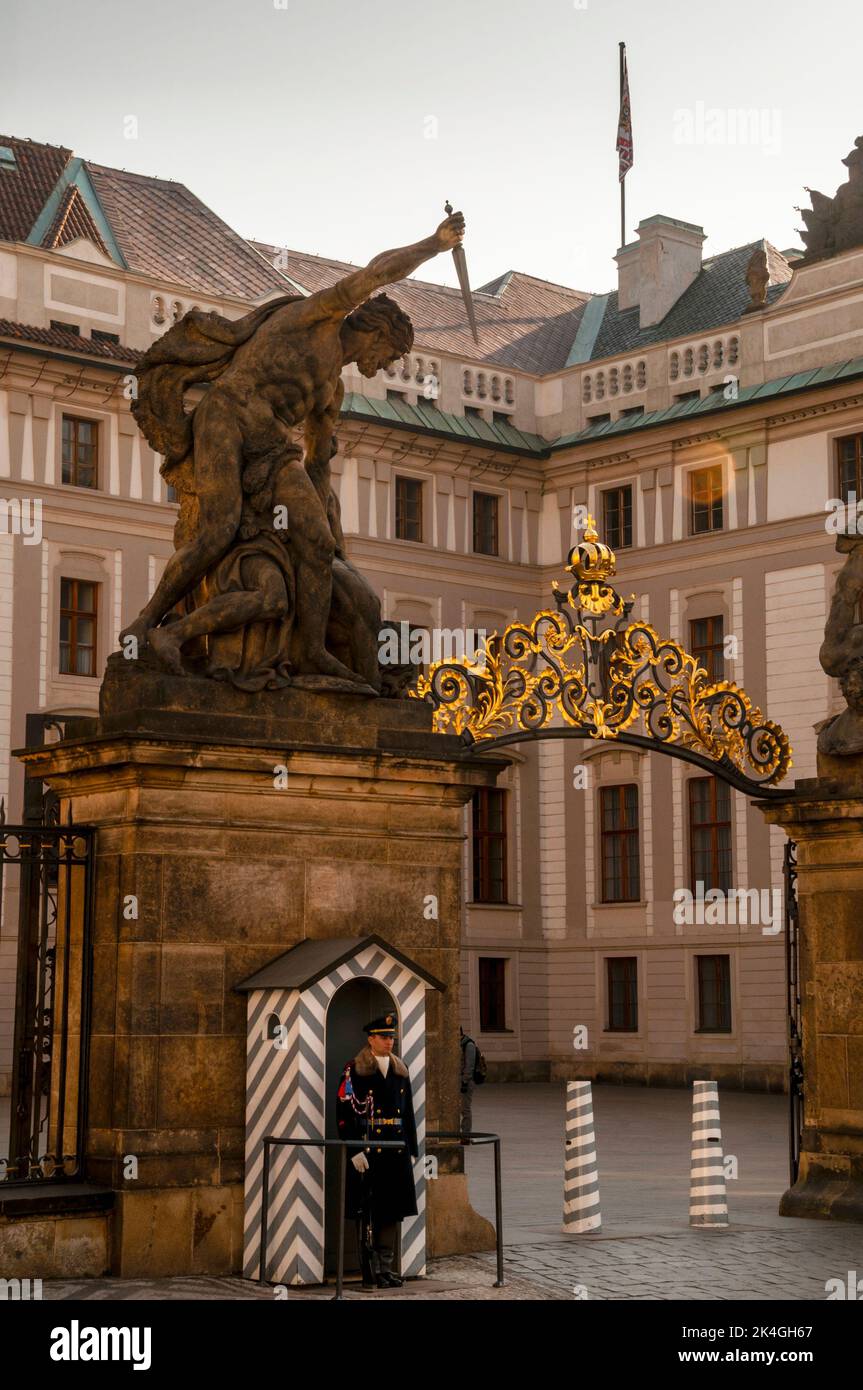 Colossus Baroque statue, gold filagree arched gate and castle guard at ...