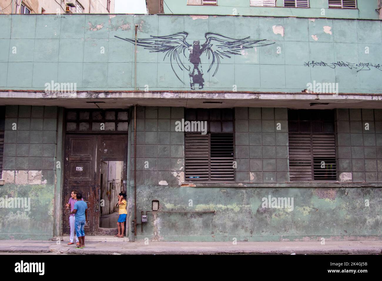 Mural of Cuban revolutionary president Fidel Castro on a building with ...
