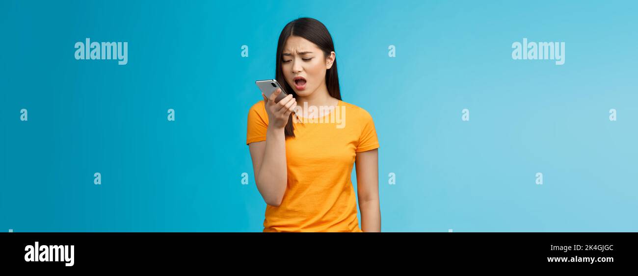 Angry asian woman shouting telephone hi-res stock photography and ...