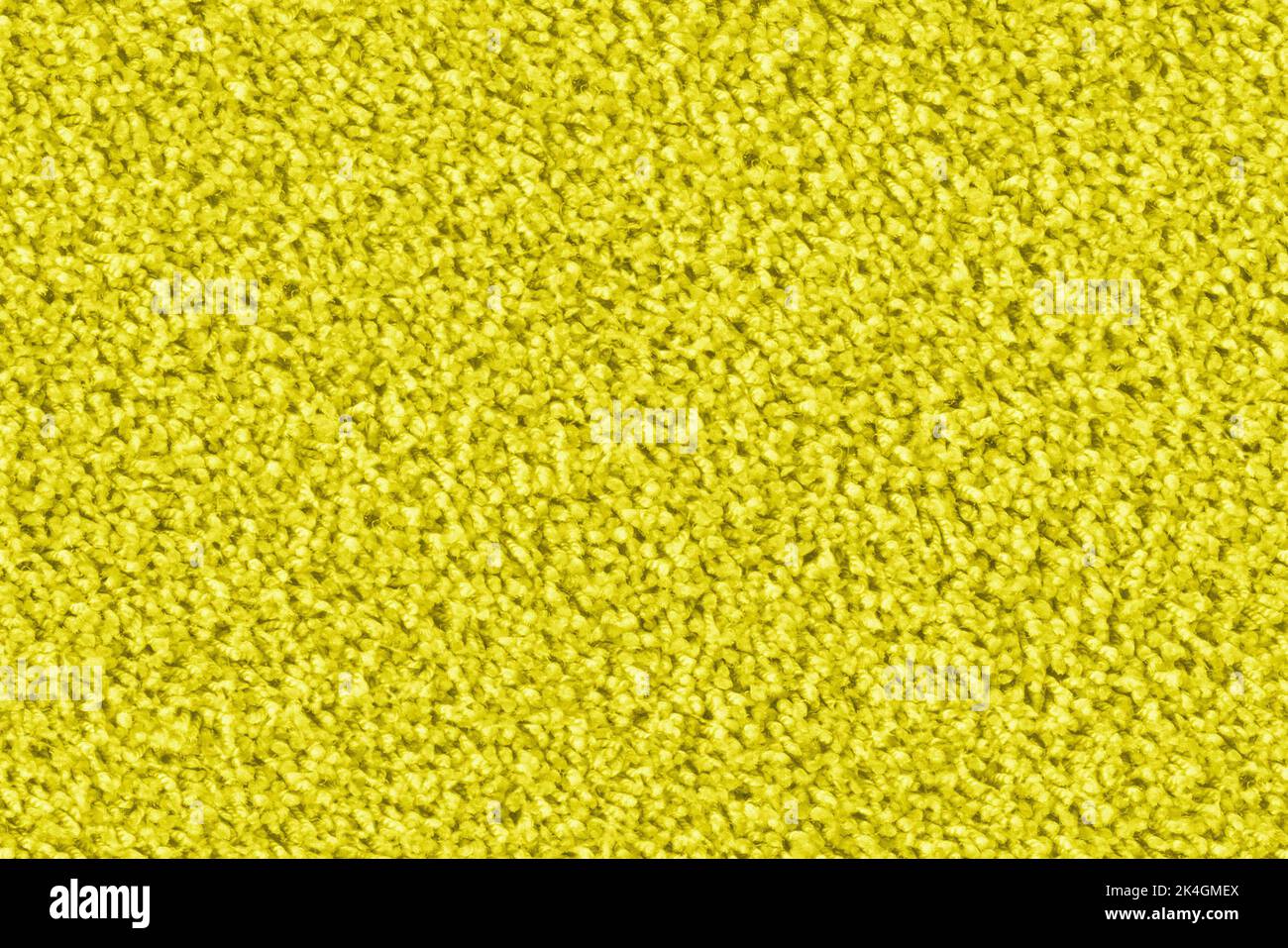 Close up of fabric textile carpet background, bright yellow color Stock ...