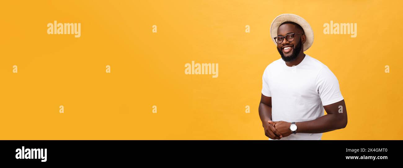 Single handsome muscular Black man with shaved head, folded arms and ...