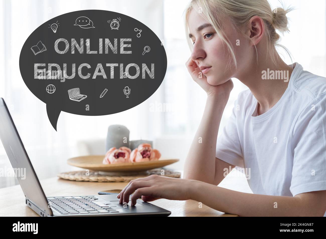 Home study. Online education. Distance learning. Pensive girl watching ...