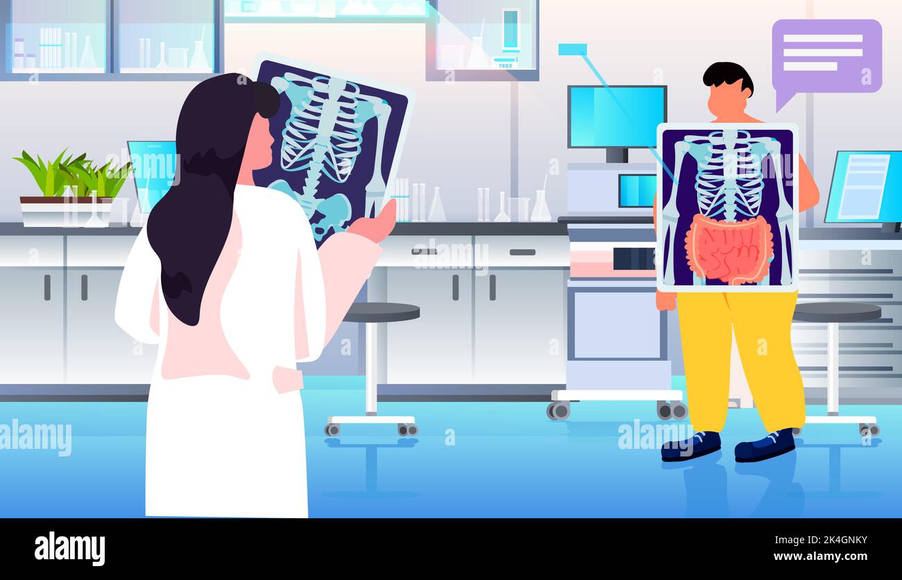 doctor examining stomach X-ray of male patient health care medical ...