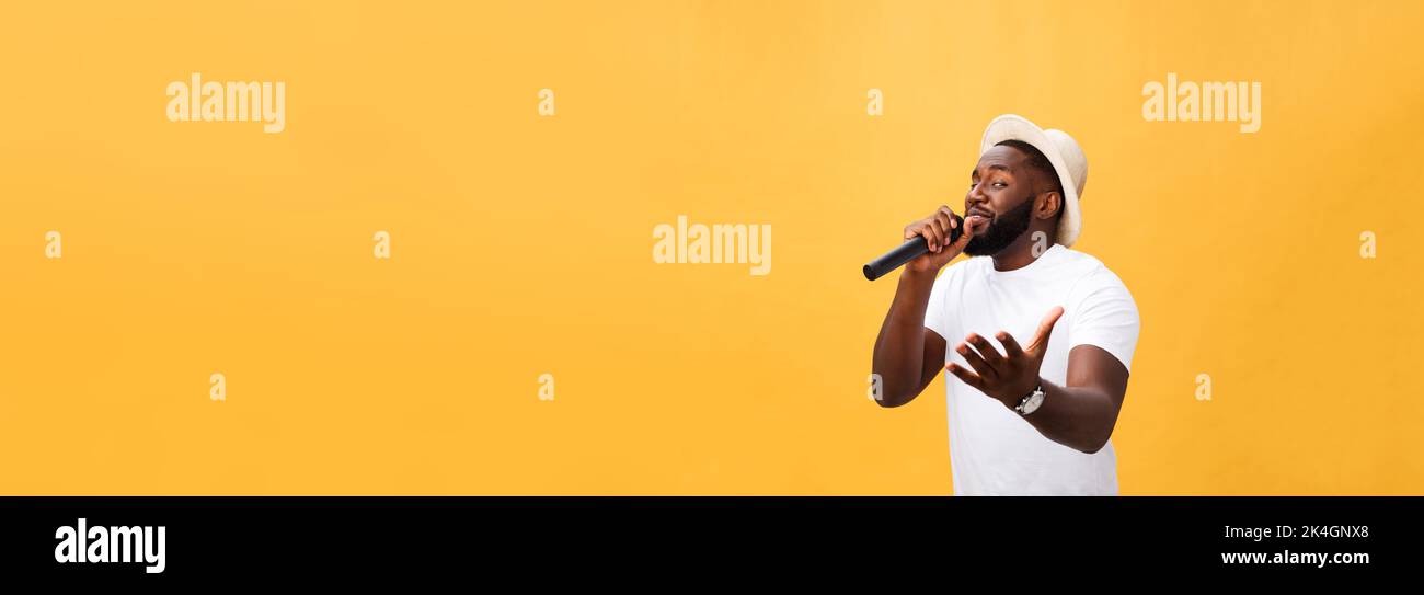 Young teenage black African American boy singer performing at a concert ...