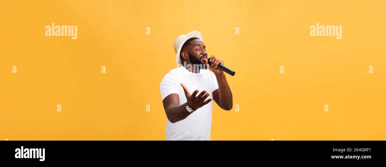 Young teenage black African American boy singer performing at a concert ...