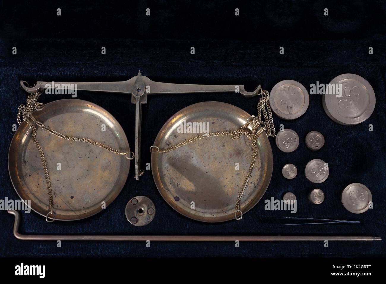 Bronze traditional balance scale set with weights in box Stock Photo ...