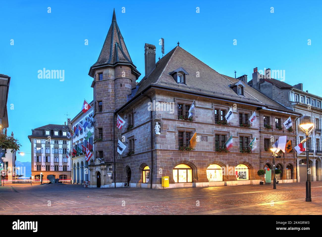 Night scene in Morges, Switzerland along the Grand Rue, focusing on the ...