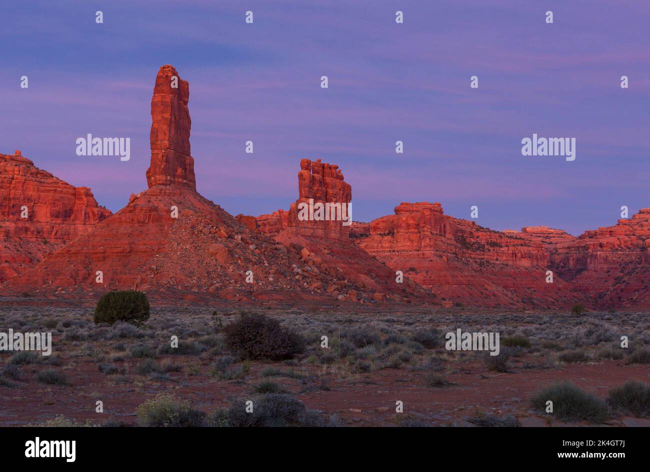 Valley of the Gods rock formation with Monument Valley at sunrise Stock ...