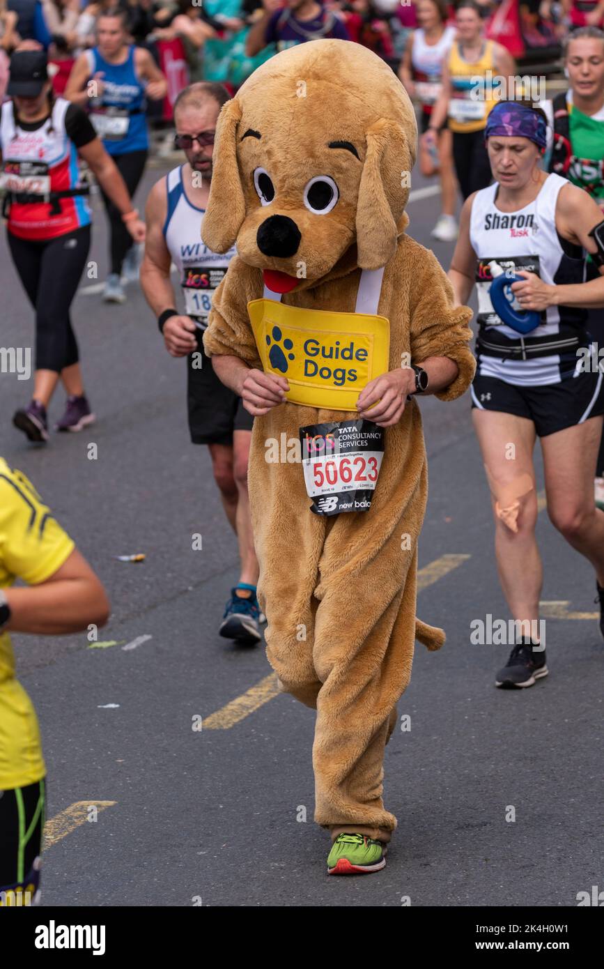 Martin Greensitt running in the TCS London Marathon 2022, on Tower Hill ...