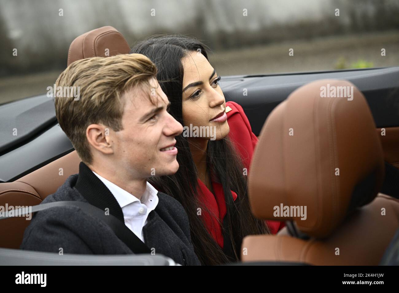 Belgian Remco Evenepoel and his girldfriend Oumi Rayane sit in a ...