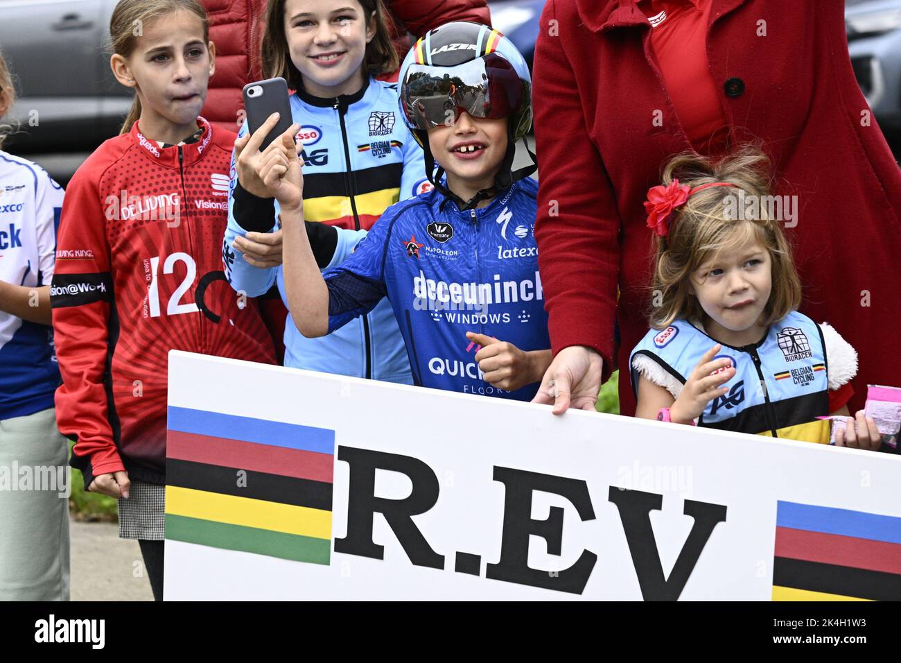 Illustration shows young supporters wearing cycling jerseys of national ...