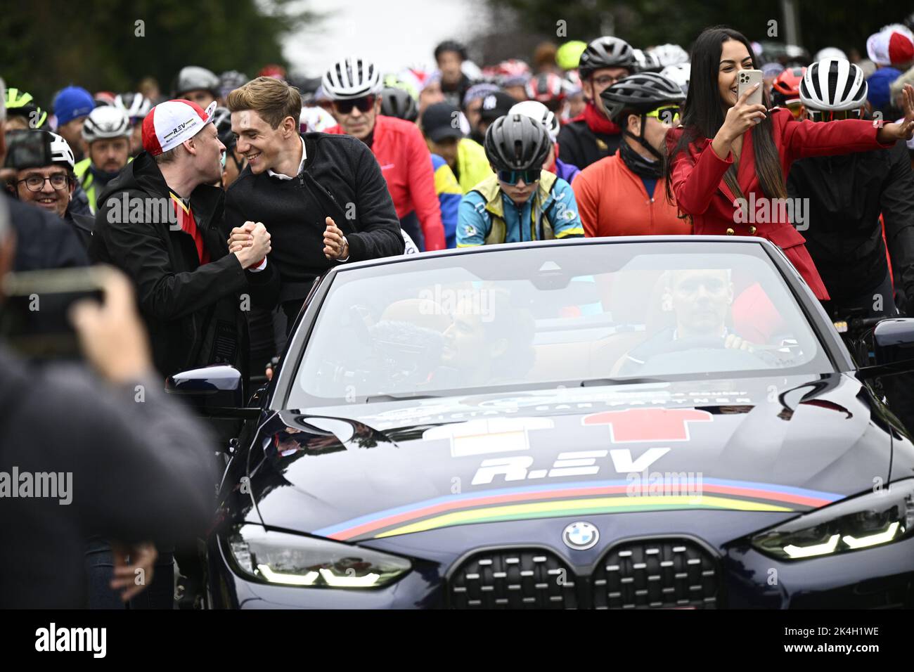 Belgian Remco Evenepoel and his girlfriend Oumi Rayane sit in a ...