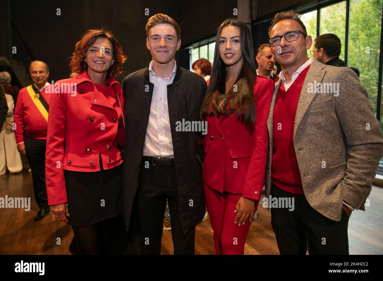 Remco Evenepoel, his partner Oumaima Oumi Rayane and parents Agna and ...