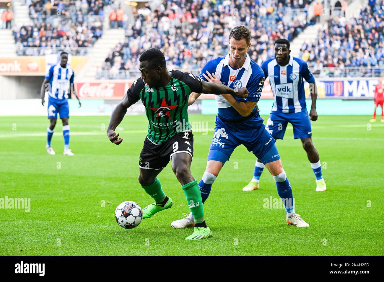 Cercle's Kevin Denkey and Gent's Bruno Godeau pictured in action during ...