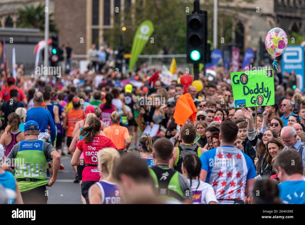 Family supporting father running in the TCS London Marathon 2022, on ...