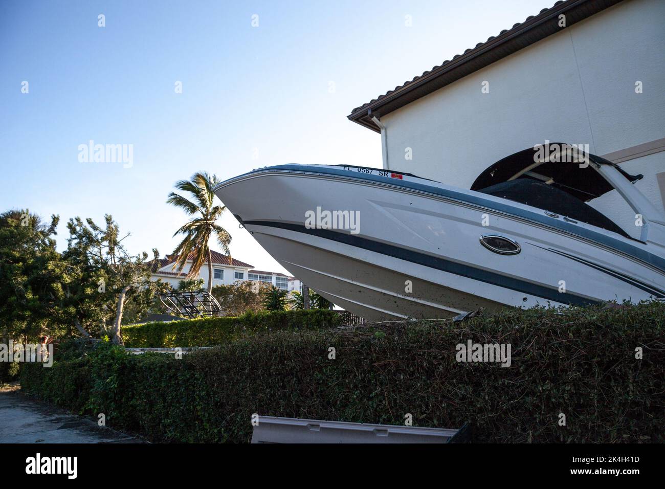 Naples, Florida, USA - September 28, 2022: NEWS – Boat wreck hangs on a ...