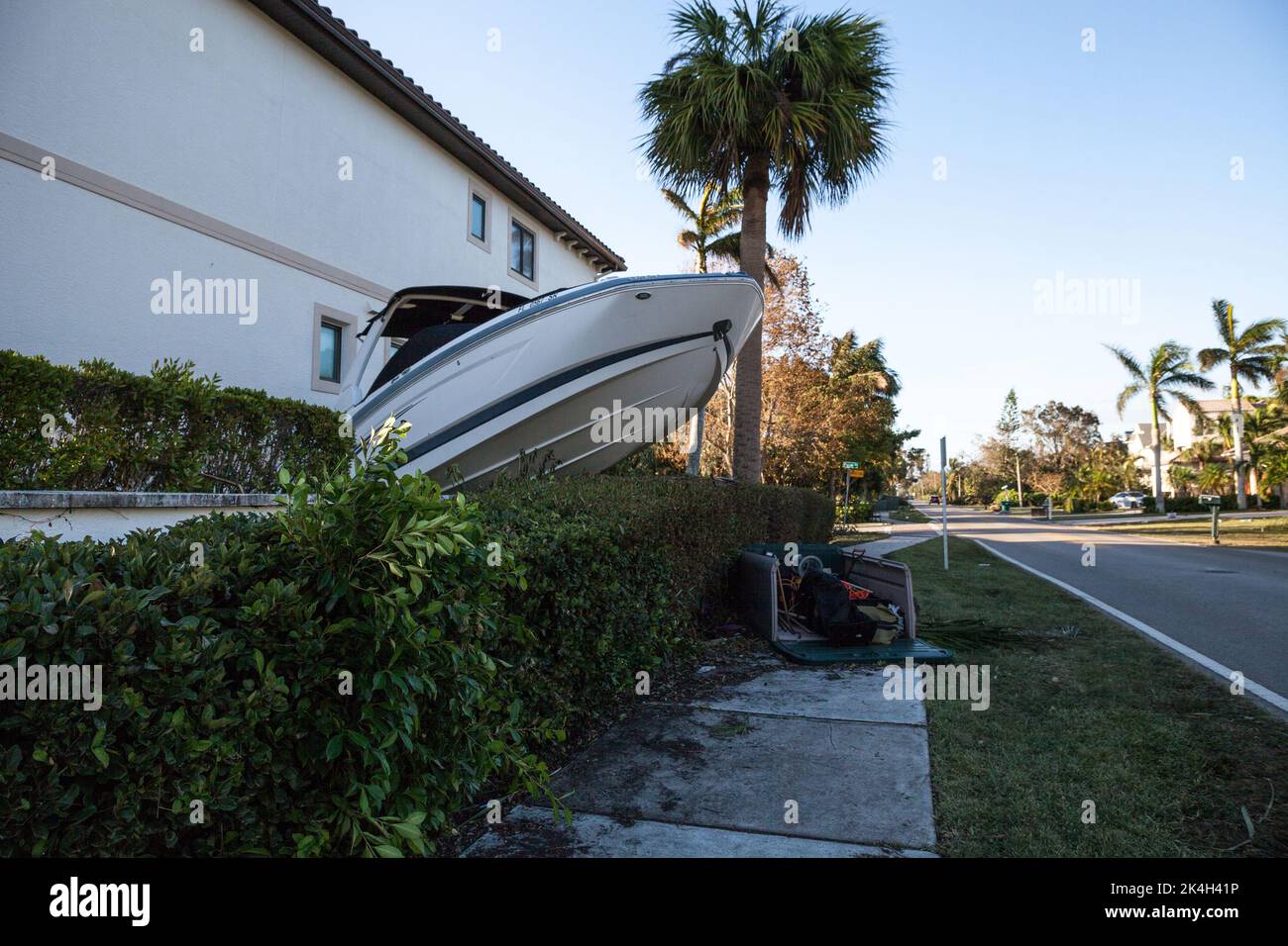 Naples, Florida, USA - September 28, 2022: NEWS – Boat wreck hangs on a ...