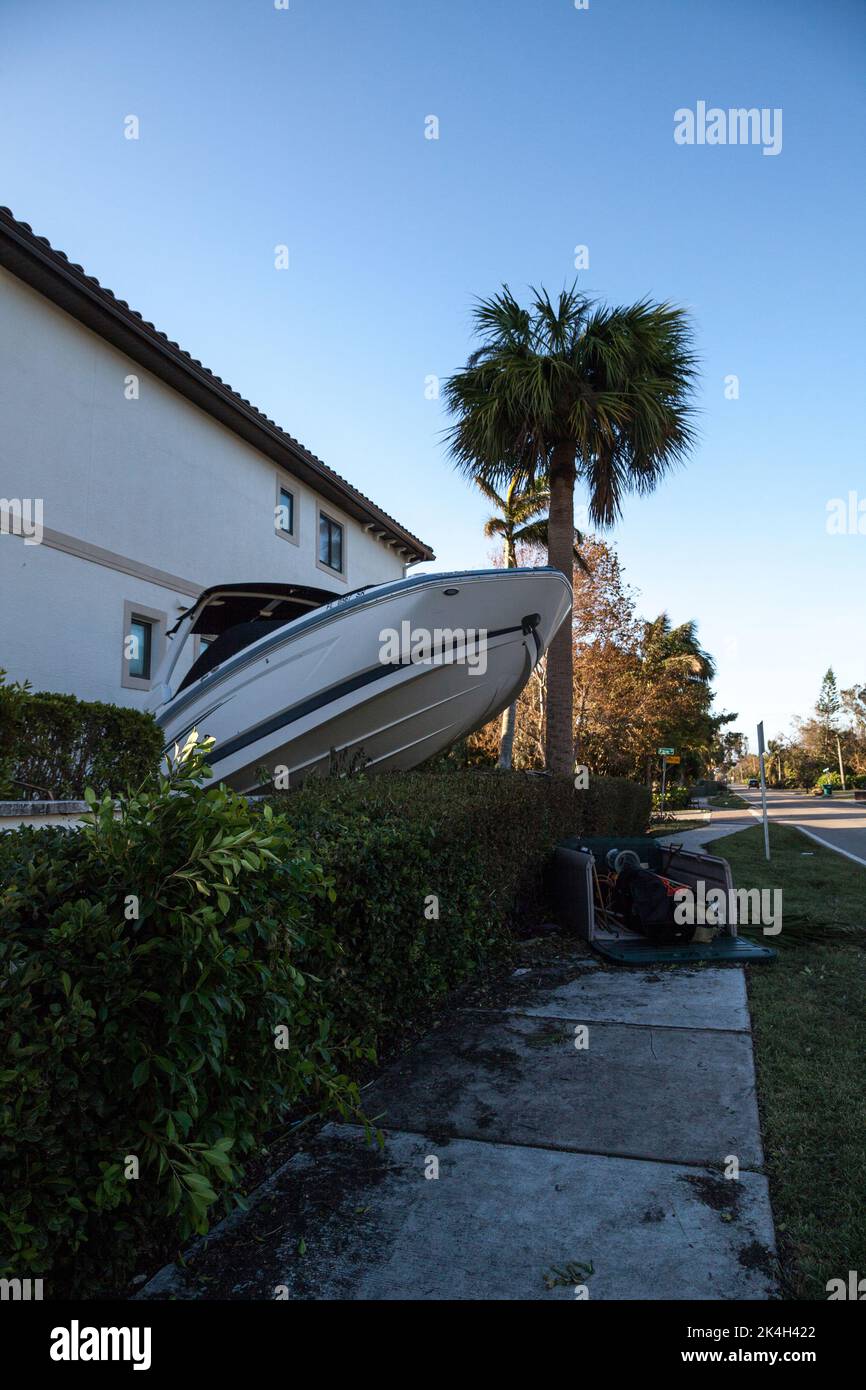 Naples, Florida, USA - September 28, 2022: NEWS – Boat wreck hangs on a ...